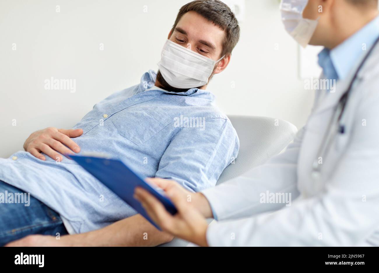 Doctor patient in protective masks hi-res stock photography and images ...
