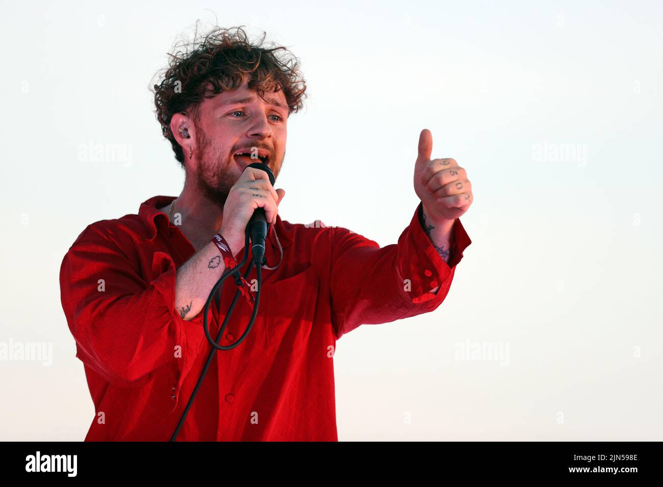 English singer songwriter Tom Grennan performs at Silverstone during ...