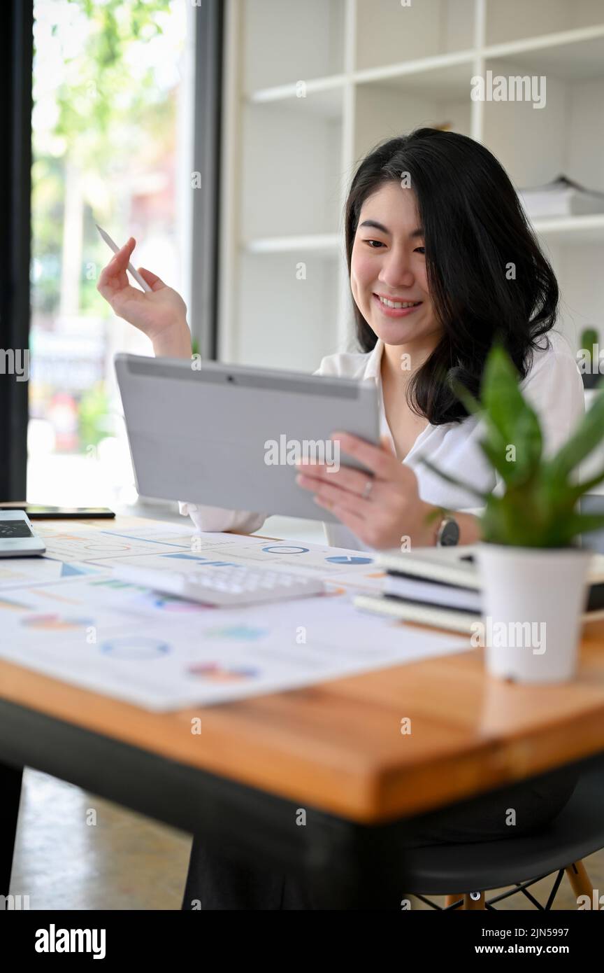 Portrait, Pretty and charming Asian businesswoman or female financial ...
