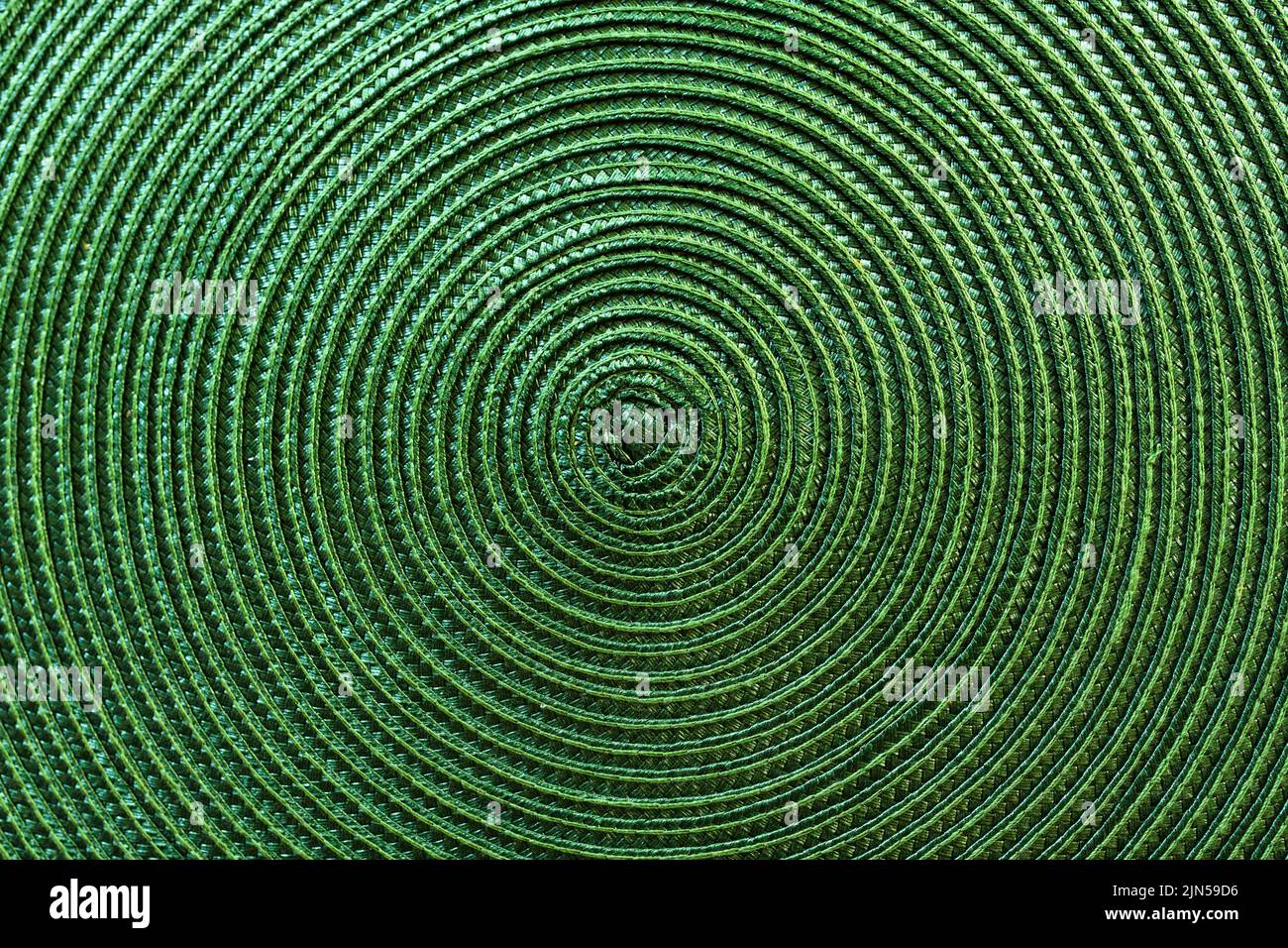 Texture of green plastic woven placemat on dining table, top view Stock ...