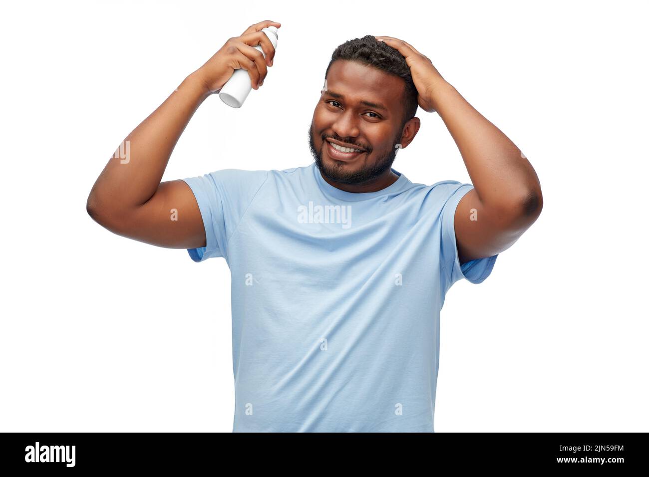 african american man applying hairspray to hair Stock Photo - Alamy