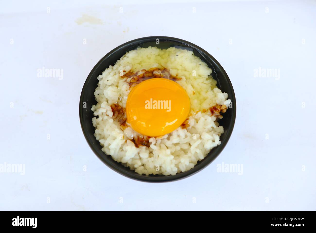 tamago kake gohan or raw egg on rice. traditional food from japan, eat ...