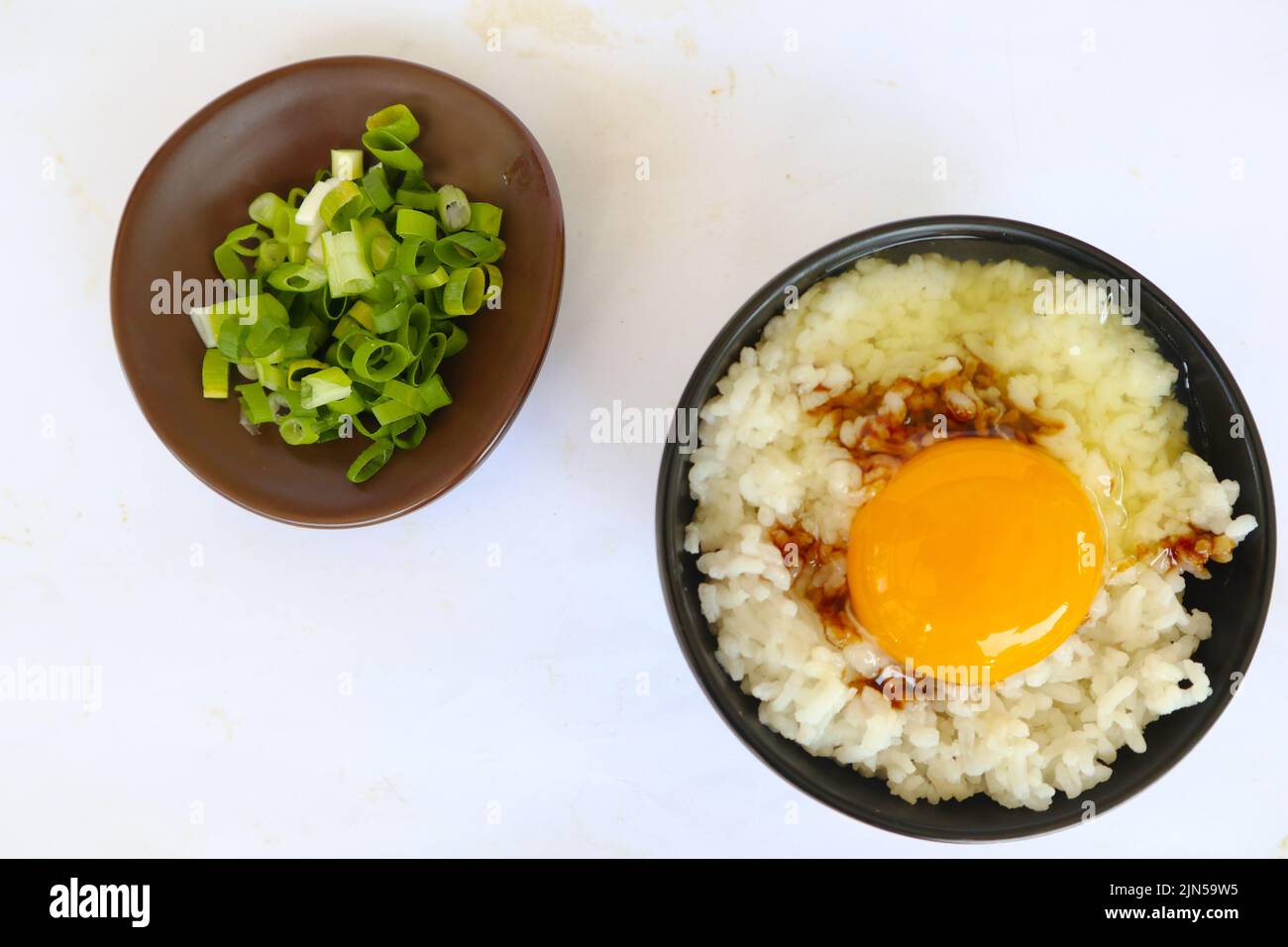 tamago kake gohan or raw egg on rice. traditional food from japan, eat ...