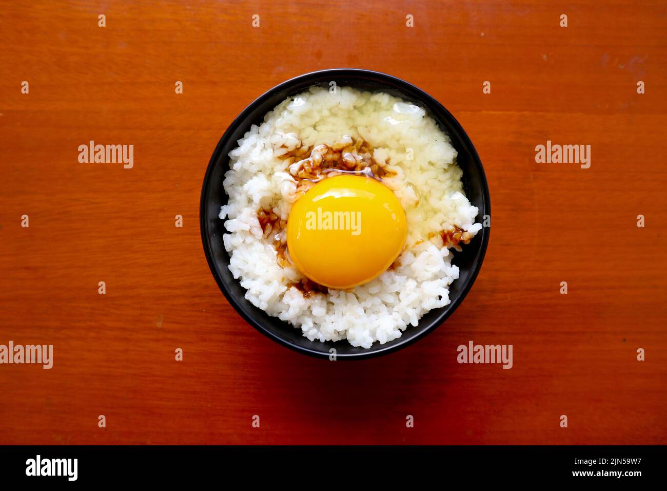 tamago kake gohan or raw egg on rice. traditional food from japan, eat ...