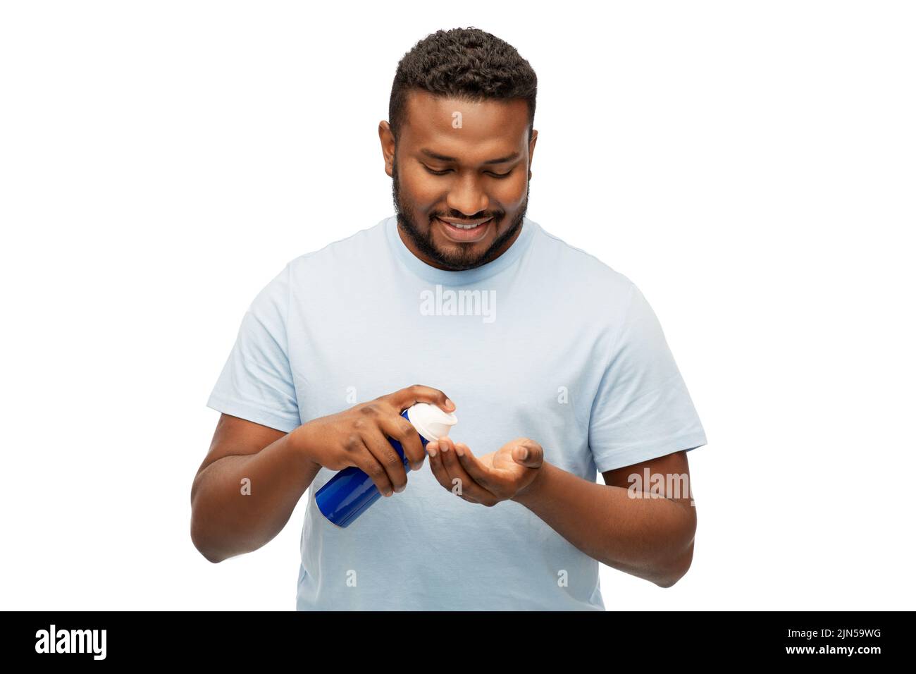 happy african man applying shaving foam to hand Stock Photo - Alamy