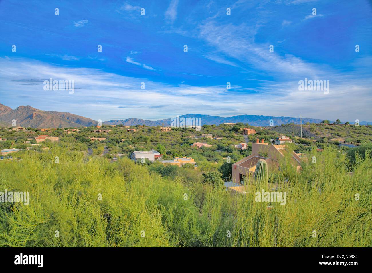 Suburban residential area on a sloped land at Tucson, Arizona. There ...