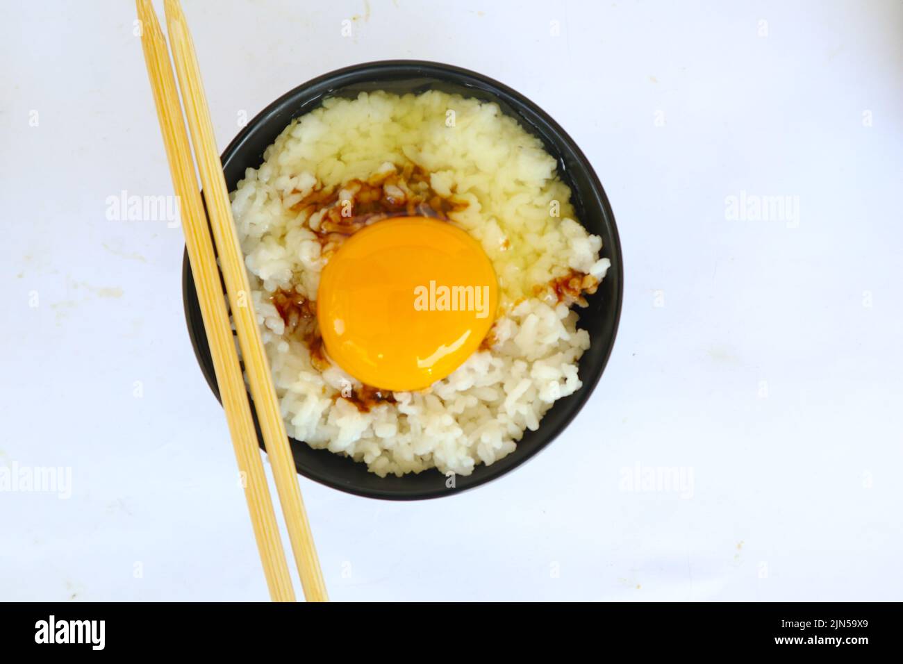 tamago kake gohan or raw egg on rice. traditional food from japan, eat ...