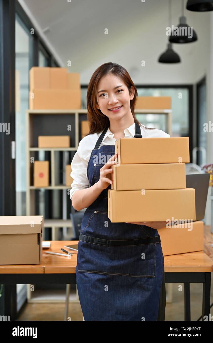 Portrait, Attractive and beautiful young Asian female e-commerce ...