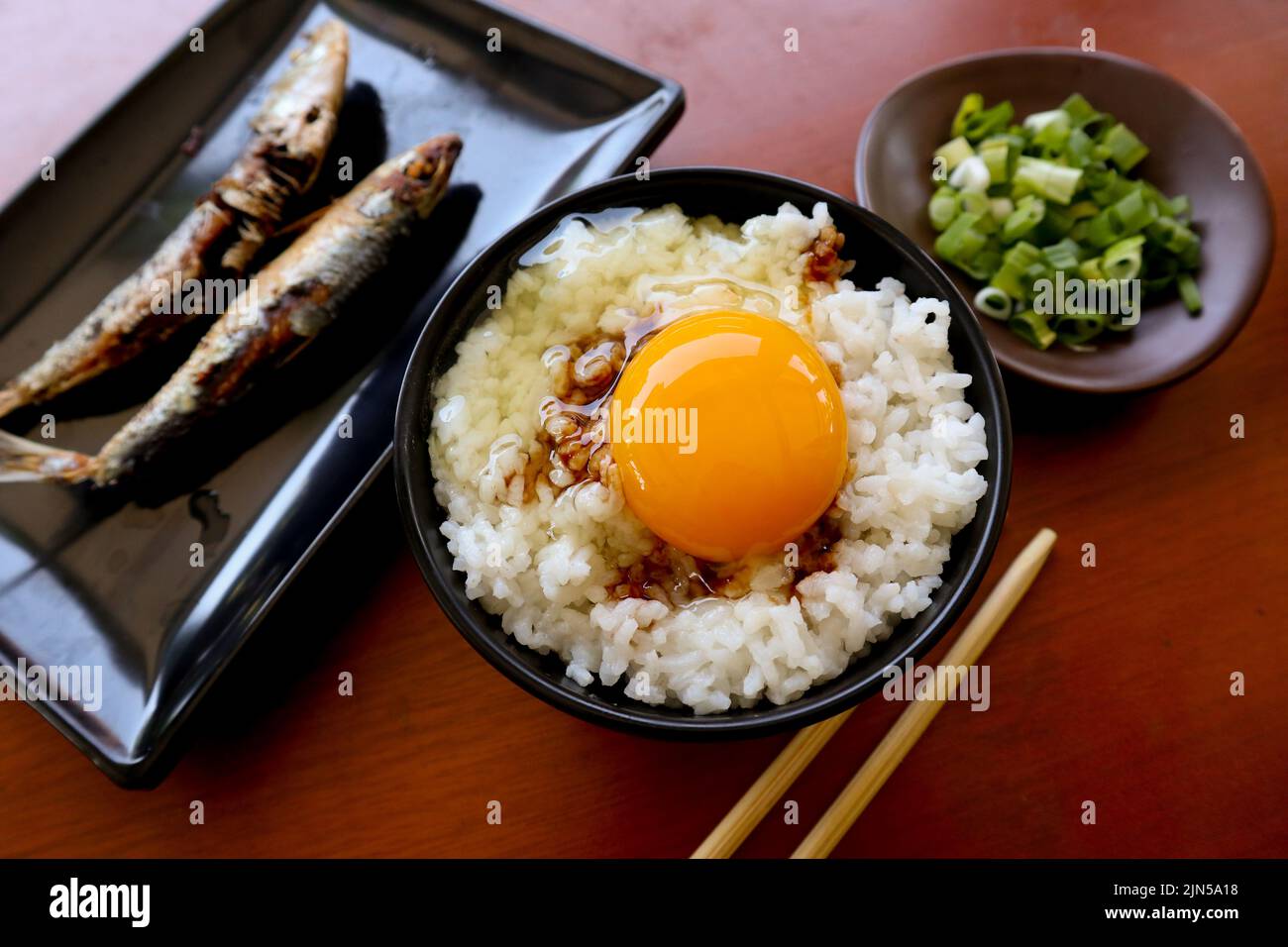 tamago kake gohan or raw egg on rice. traditional food from japan, eat ...