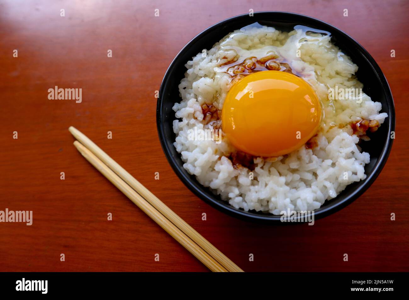 tamago kake gohan or raw egg on rice. traditional food from japan, eat ...