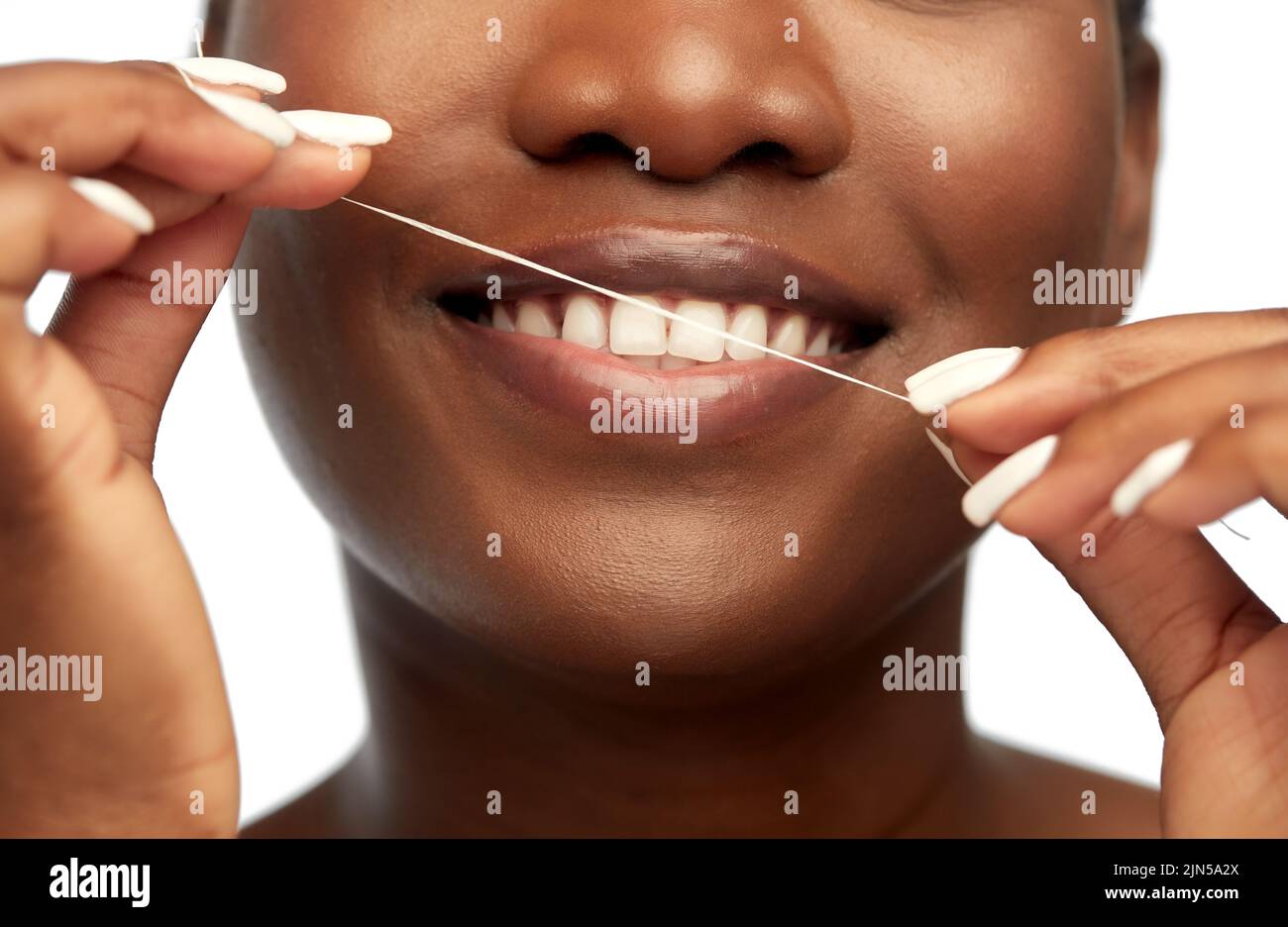 african woman cleaning teeth with dental floss Stock Photo - Alamy