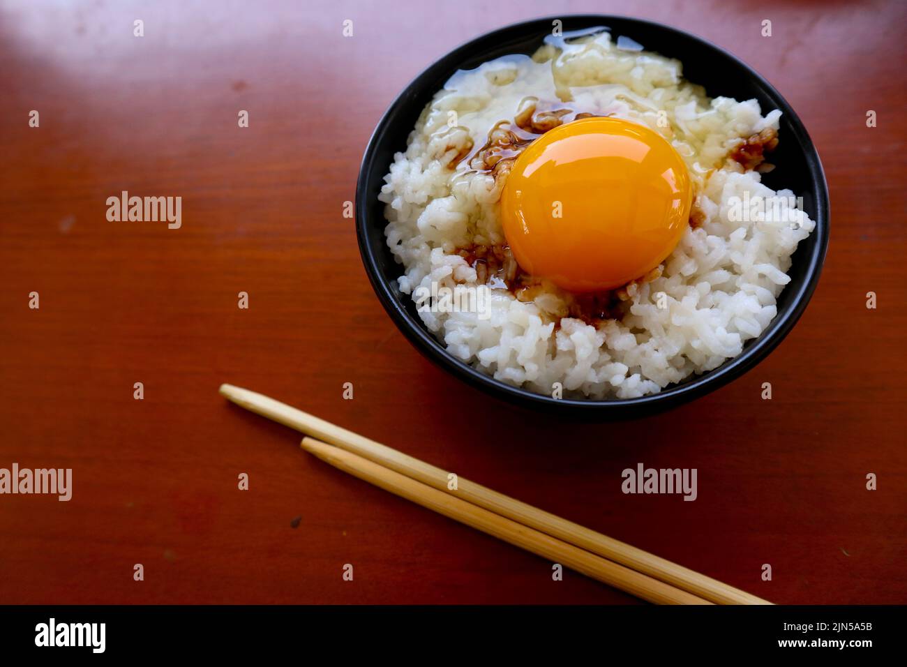 tamago kake gohan or raw egg on rice. traditional food from japan, eat ...