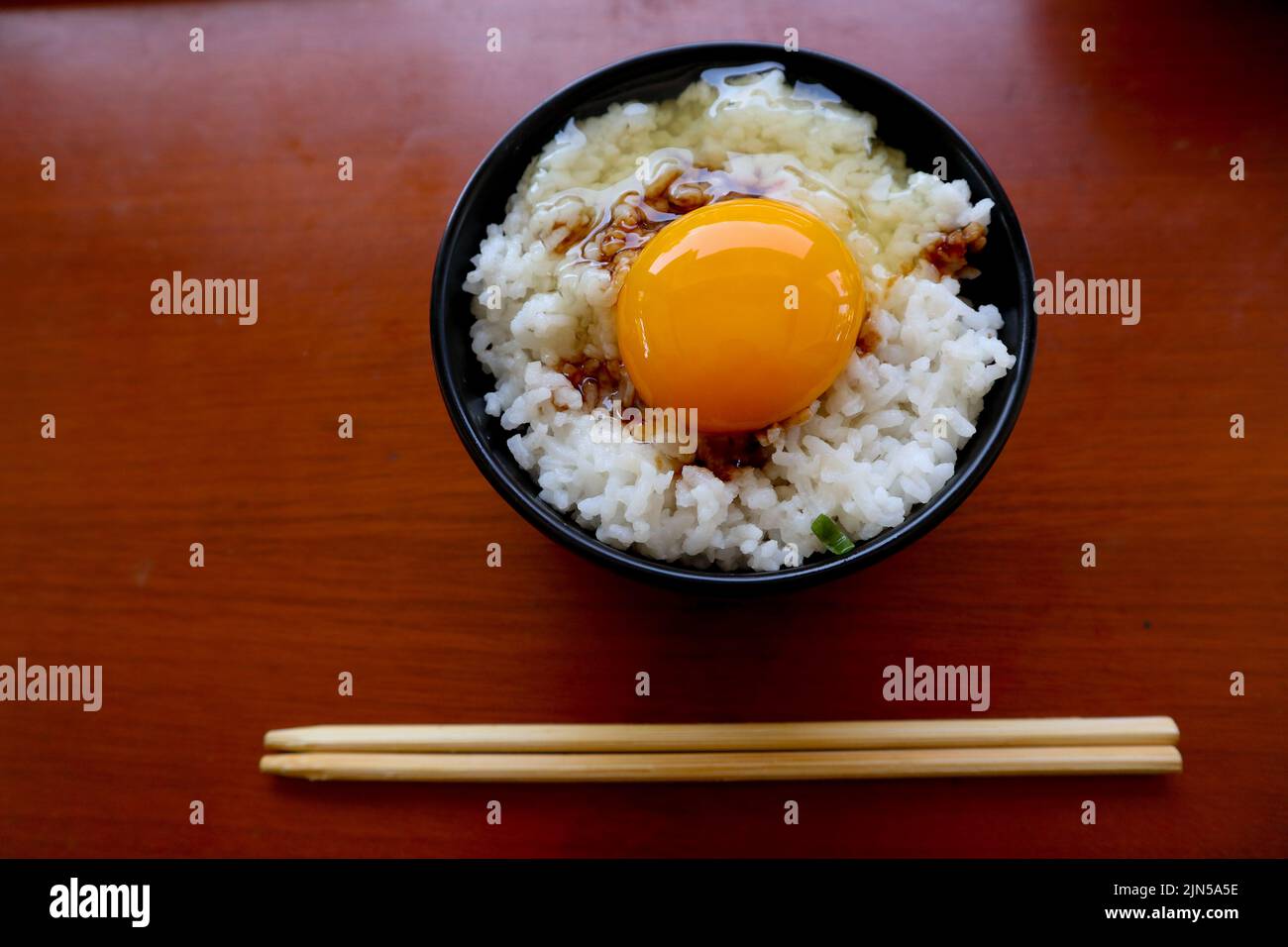 tamago kake gohan or raw egg on rice. traditional food from japan, eat ...