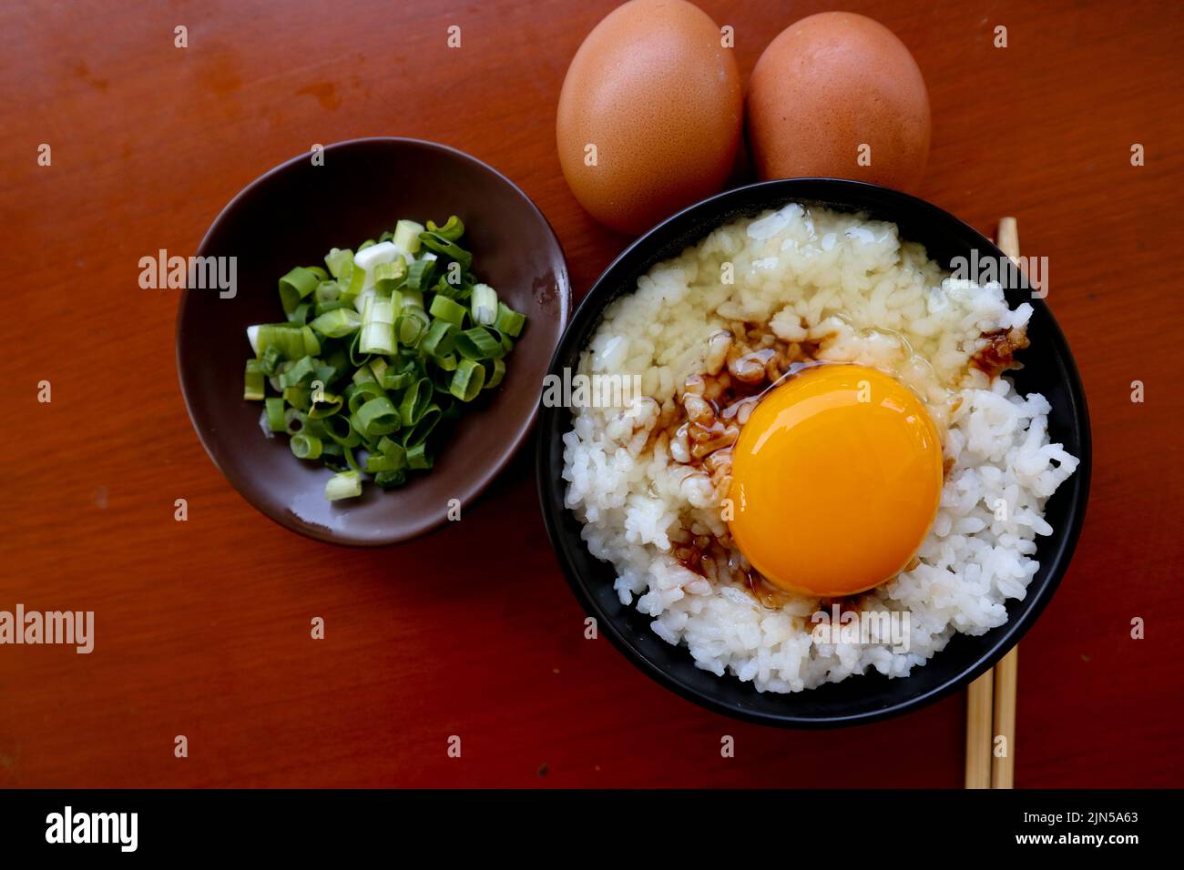 tamago kake gohan or raw egg on rice. traditional food from japan, eat ...