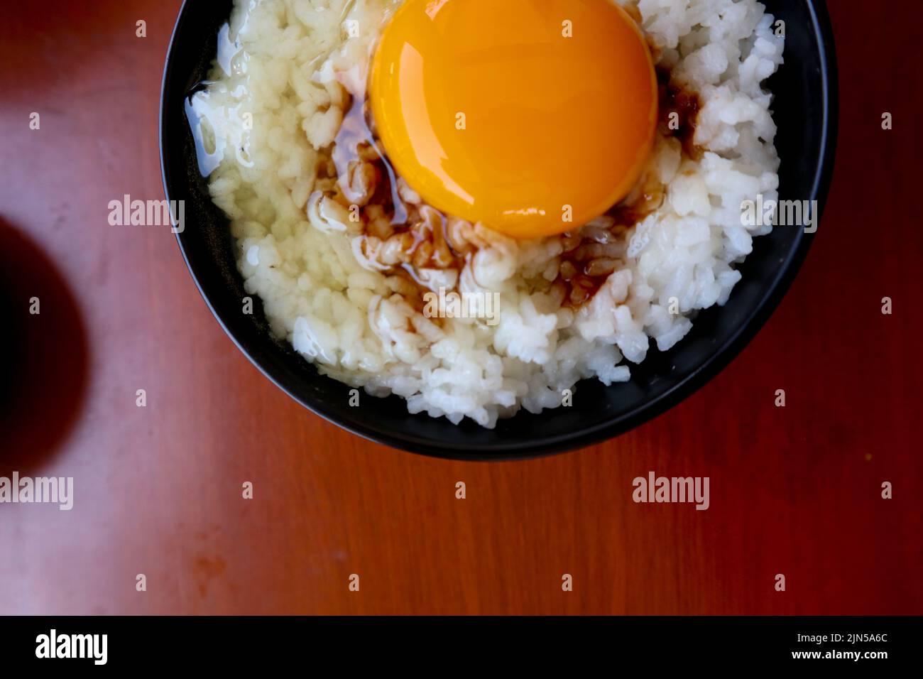 tamago kake gohan or raw egg on rice. traditional food from japan, eat ...