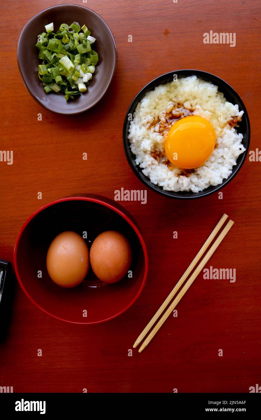 tamago kake gohan or raw egg on rice. traditional food from japan, eat ...