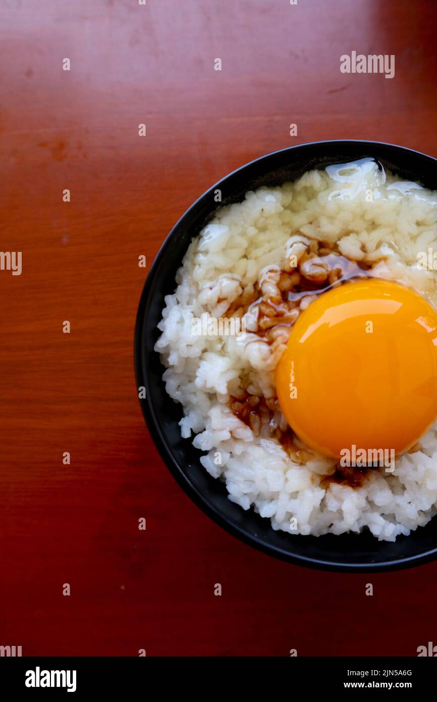 tamago kake gohan or raw egg on rice. traditional food from japan, eat ...