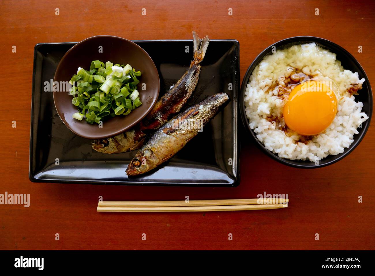tamago kake gohan or raw egg on rice. traditional food from japan, eat ...
