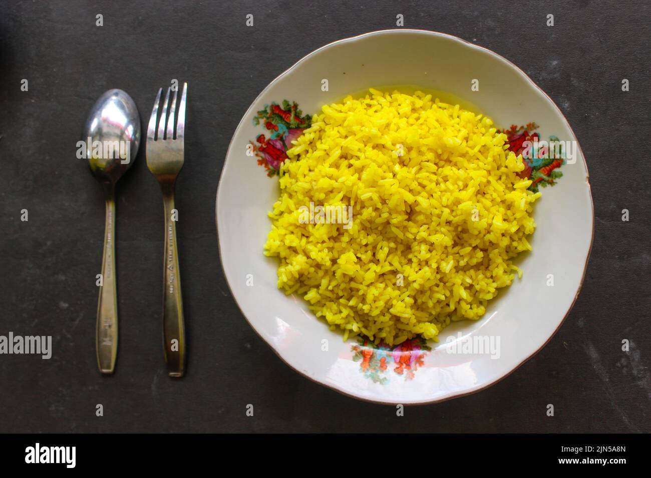 yellow rice or turmeric rice or nasi kuning is food made from rice ...