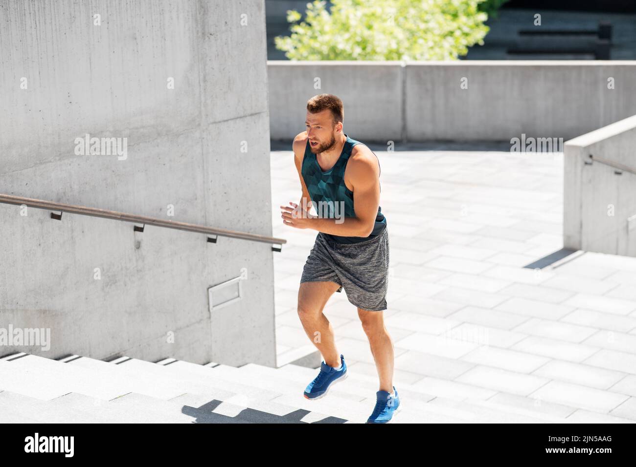 Man running up stairs training hi-res stock photography and images - Alamy
