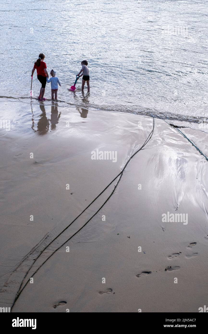 Family playing on the beach in St Ives, Cornwall Stock Photo - Alamy