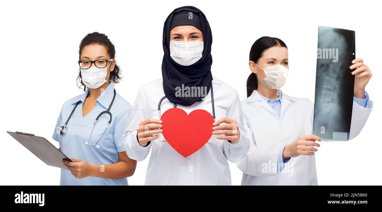 group of female doctors in masks with stethoscopes Stock Photo - Alamy