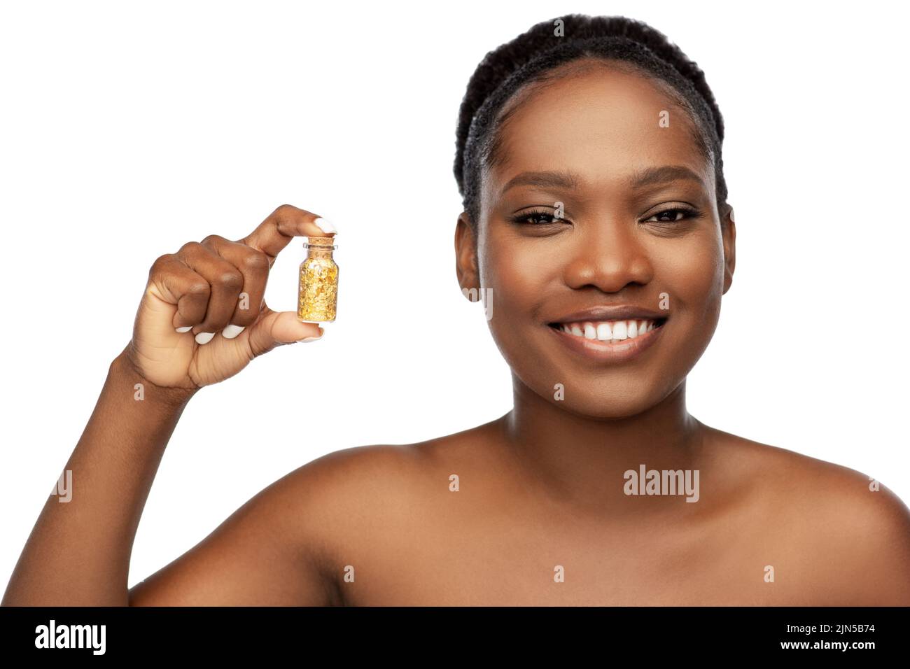 African mask gold hi-res stock photography and images - Alamy