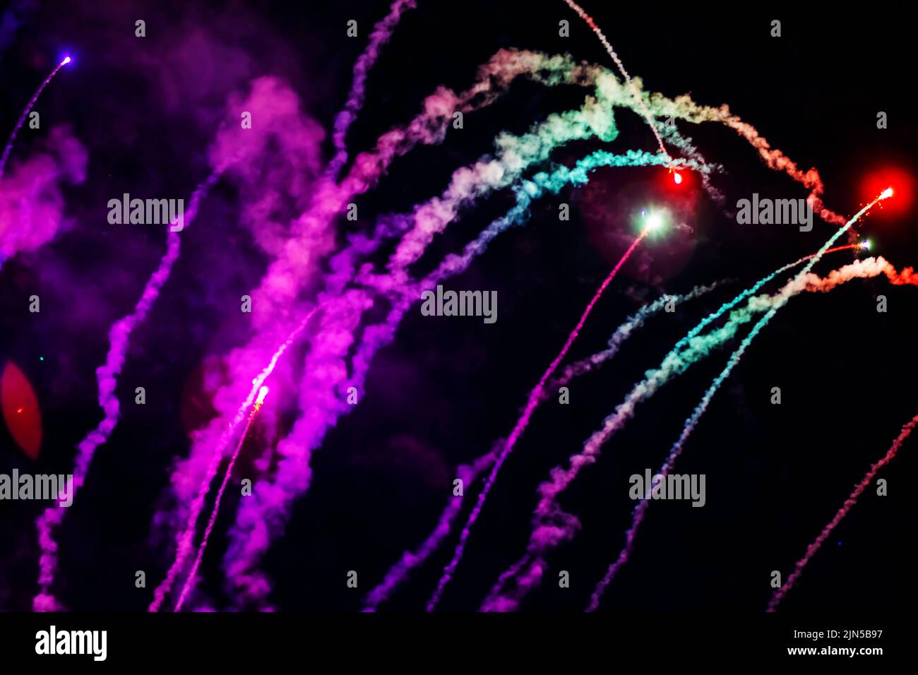 Beautiful multi-colored fireworks against the background of the night ...