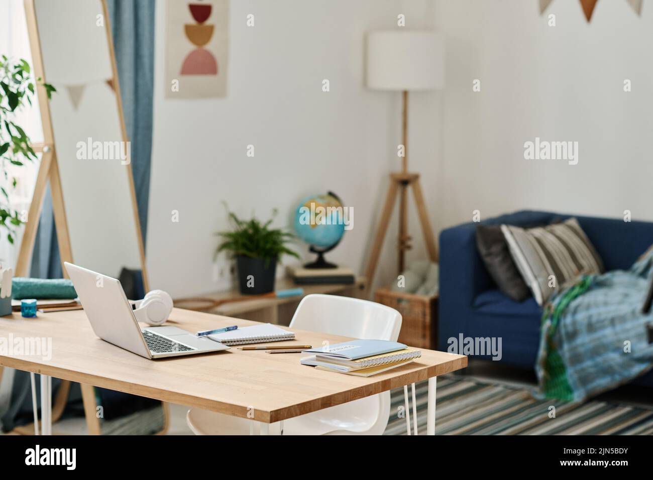 Horizontal image of desk with laptop for online studying standing in ...