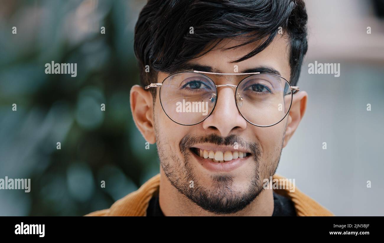Male portrait headshot young handsome happy indian guy looking at ... Male portrait headshot young handsome happy indian guy looking at ...