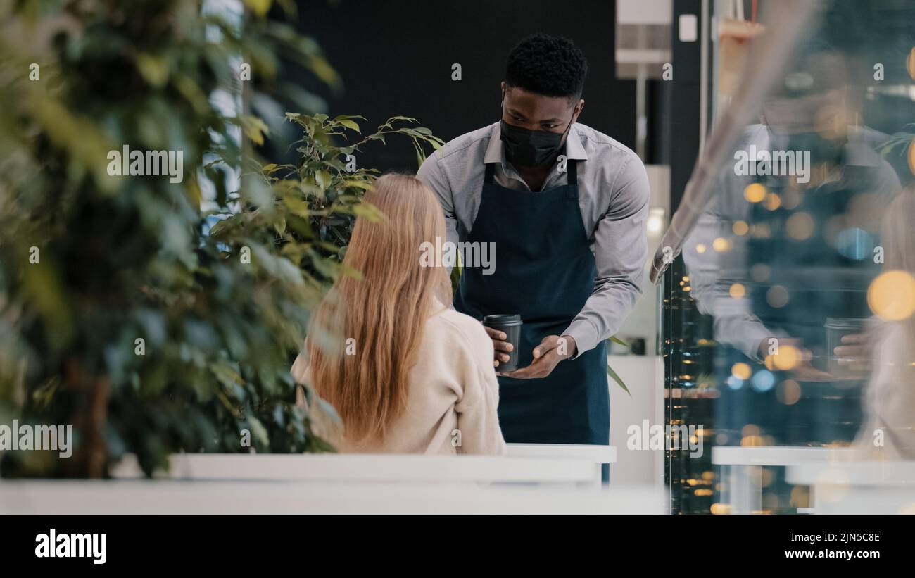 Young professional male waiter in apron restaurant worker in medical ...