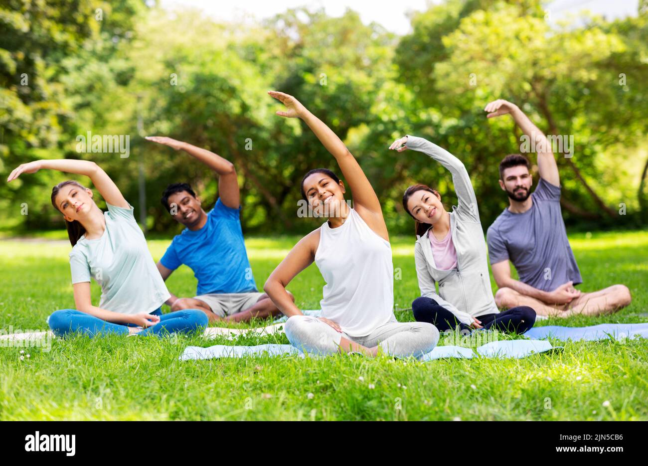 African american asian friends exercising hi-res stock photography and ...