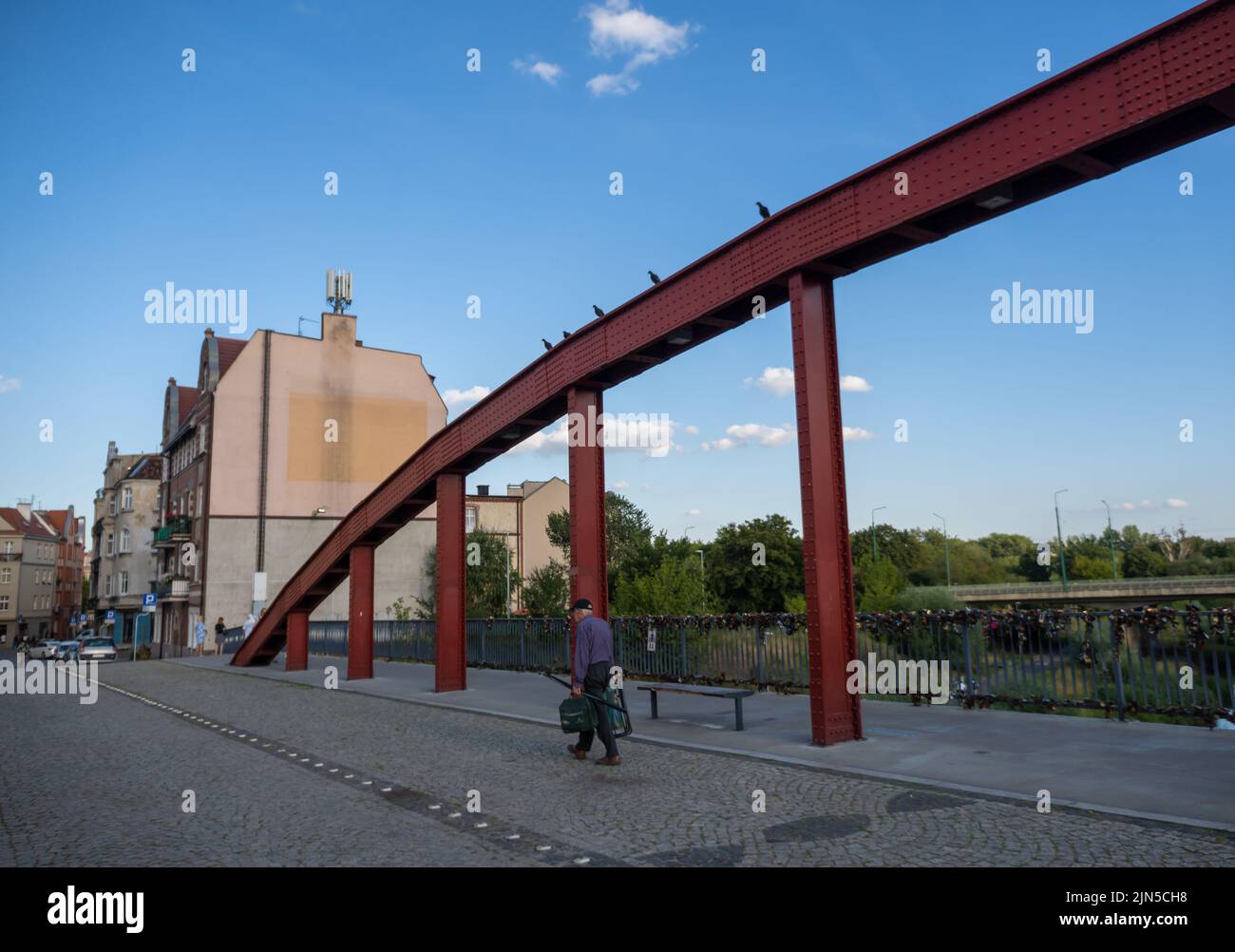 Man sitting on a bridge hi-res stock photography and images - Alamy