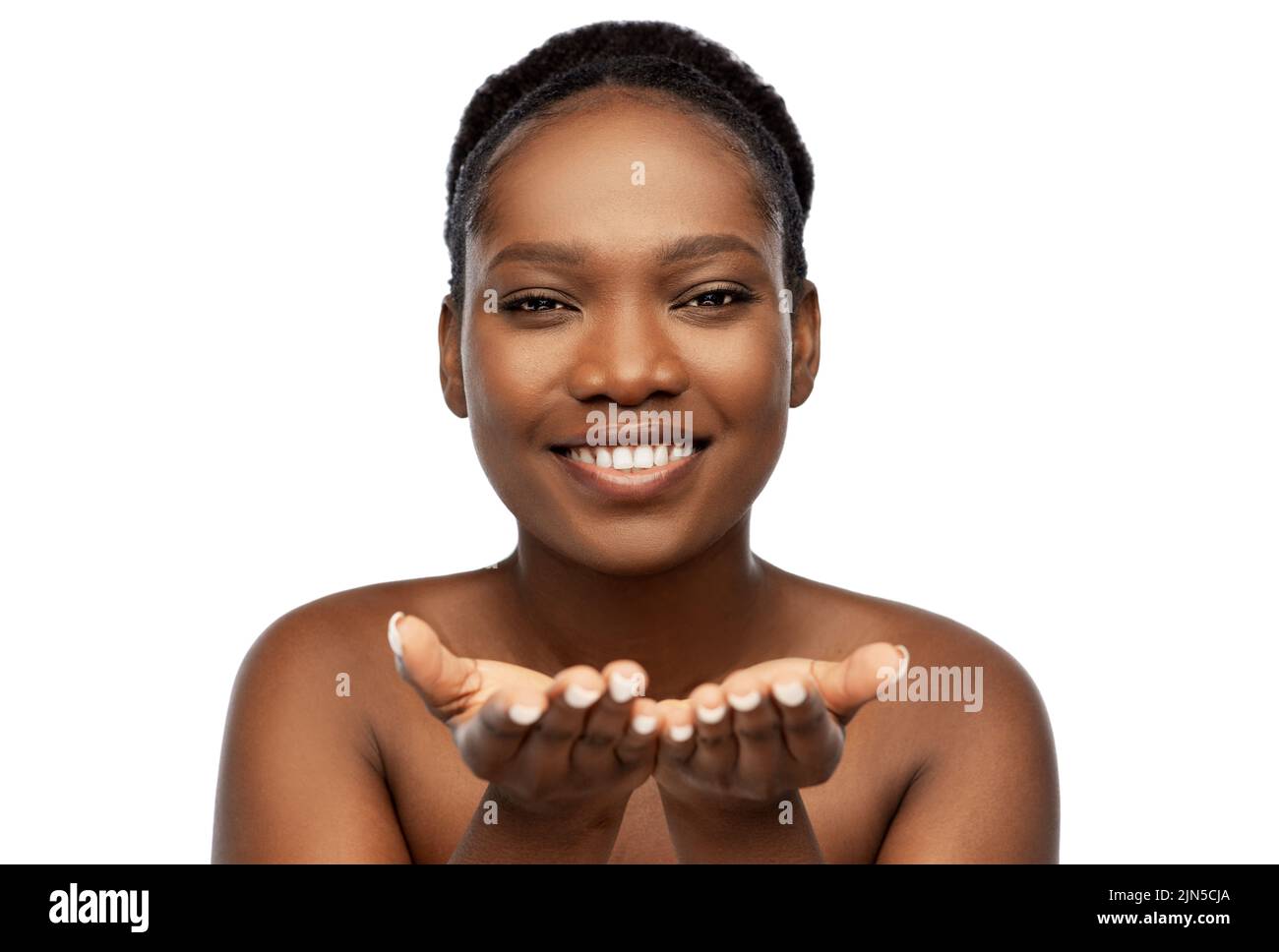 happy african american woman holding something Stock Photo - Alamy