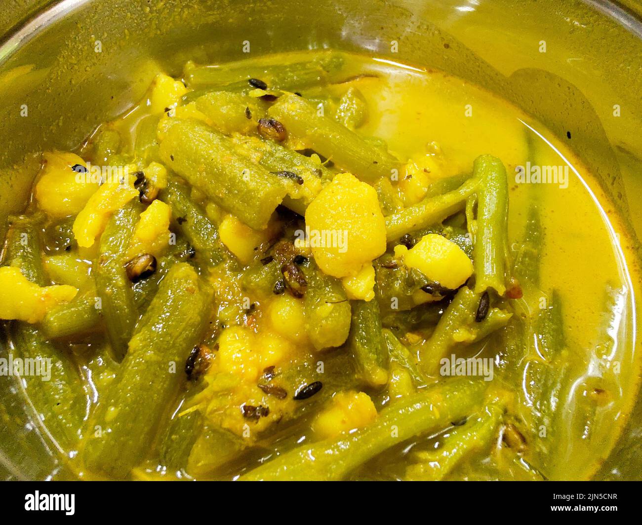 A sabjee(Veg) dish in a tiffin container. The dish looks delicious to ...