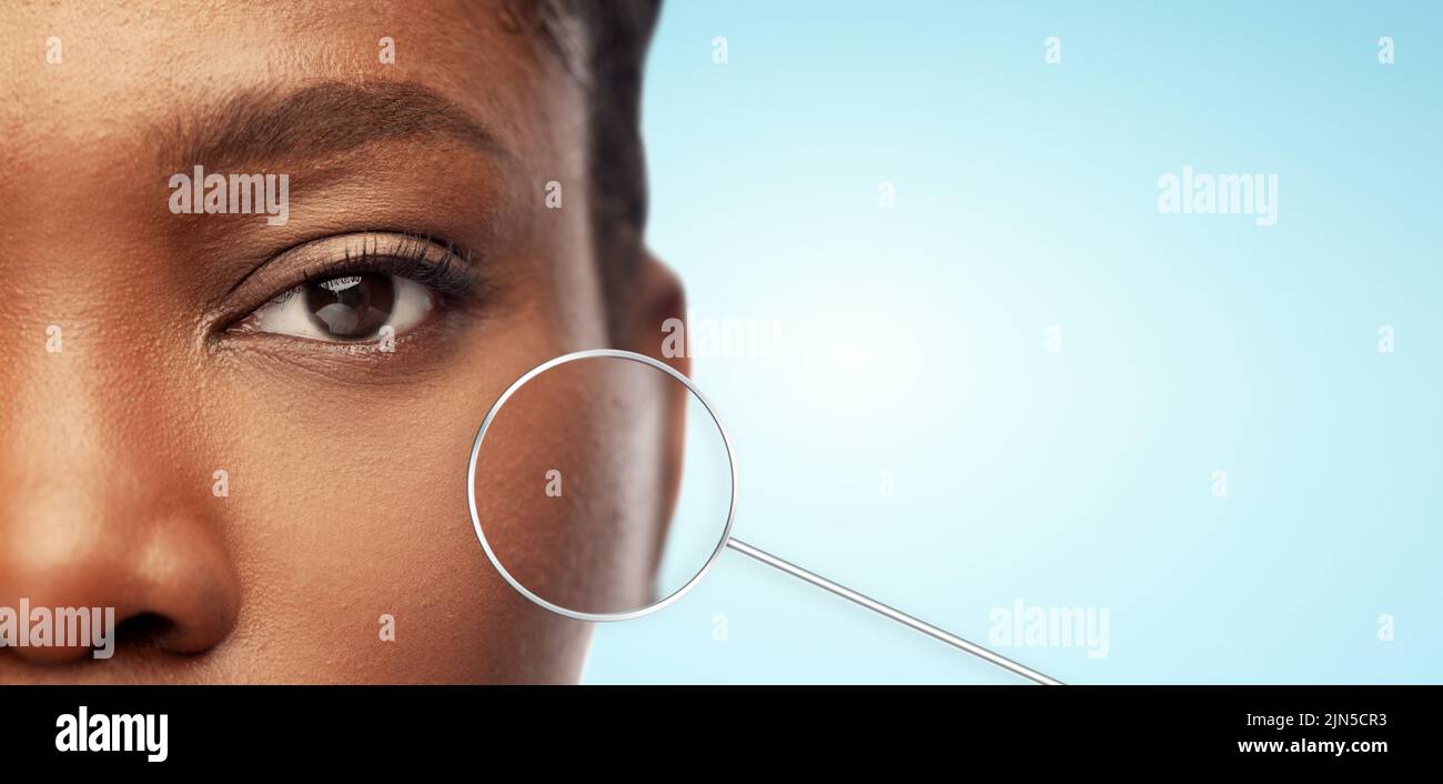 close up of african woman skin in magnifier Stock Photo - Alamy