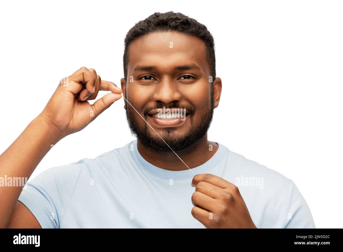 happy african man with dental floss cleaning teeth Stock Photo - Alamy