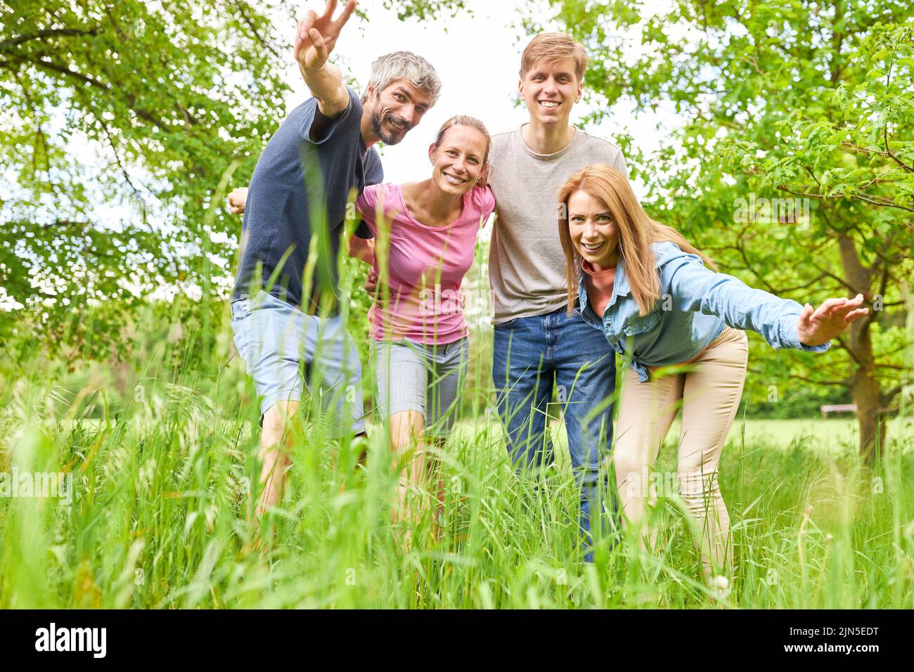 Young people go on an outing in nature in summer as friends or as ...
