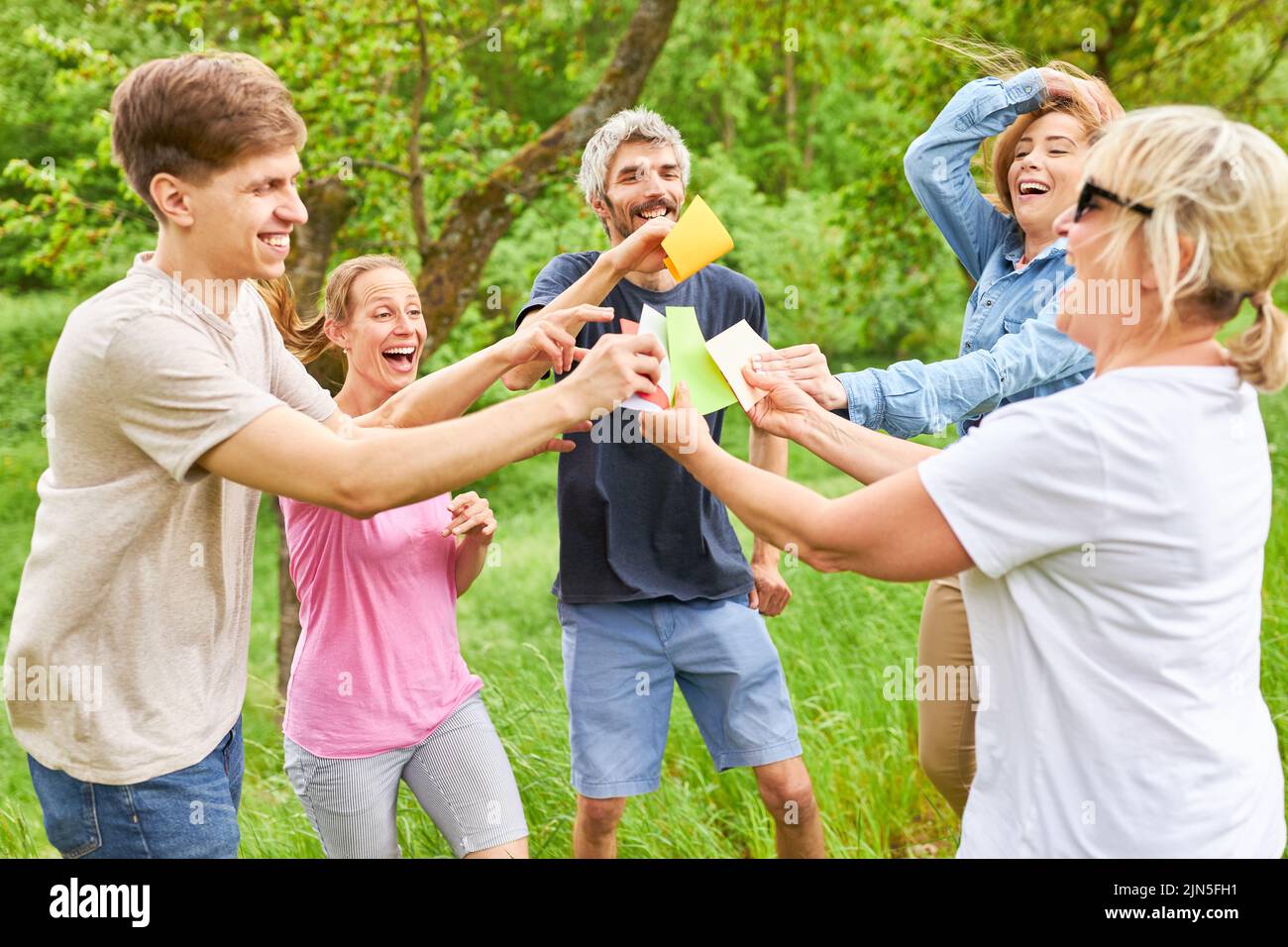 Young people draw colorful cards for motivation and integration in team building workshop Stock ...