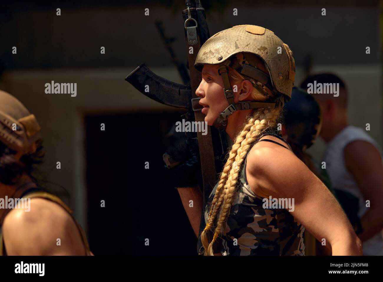 Caucasian Military lady woman in tactical gear posing for photo at ...