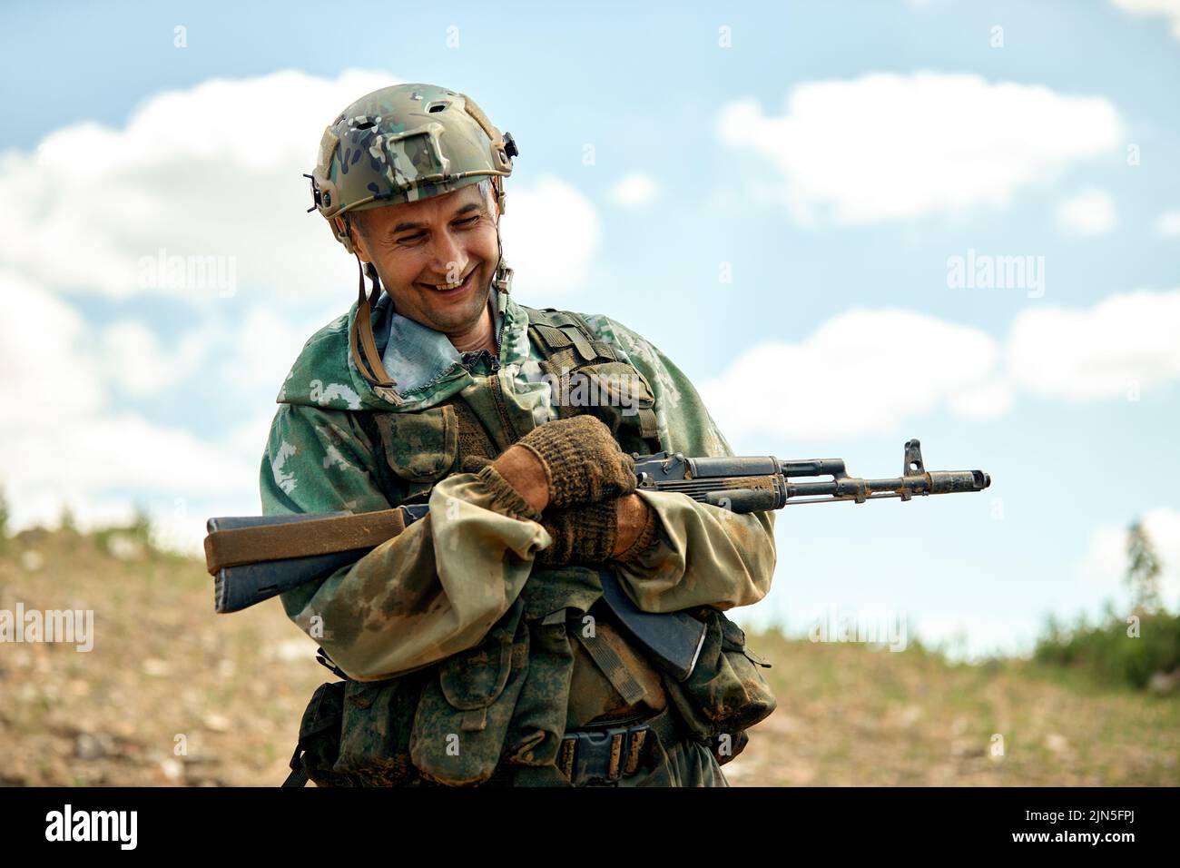 Special forces soldier with weapon take part in military maneuver. War ...