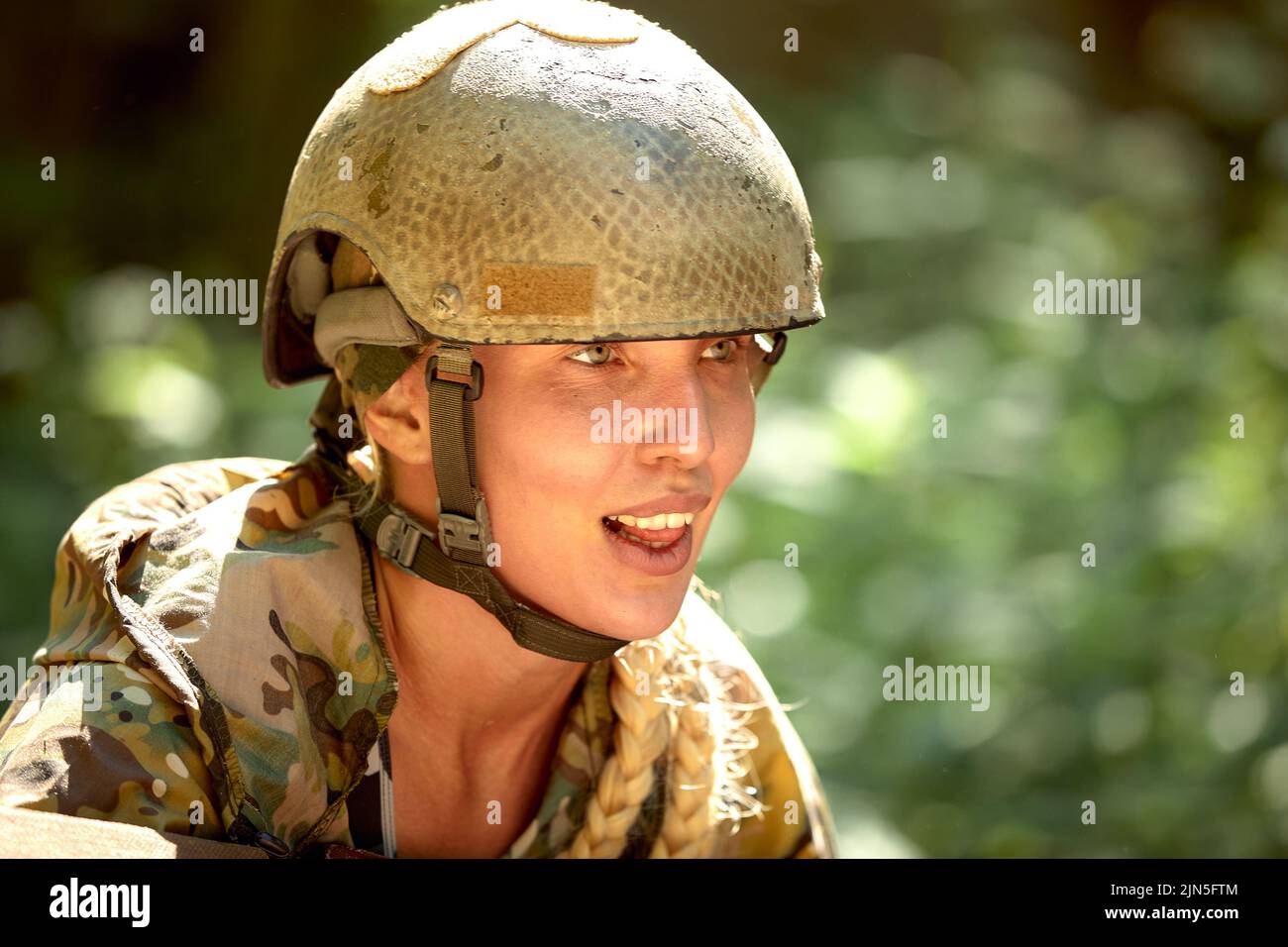 Caucasian Military lady woman in tactical gear posing for photo at ...