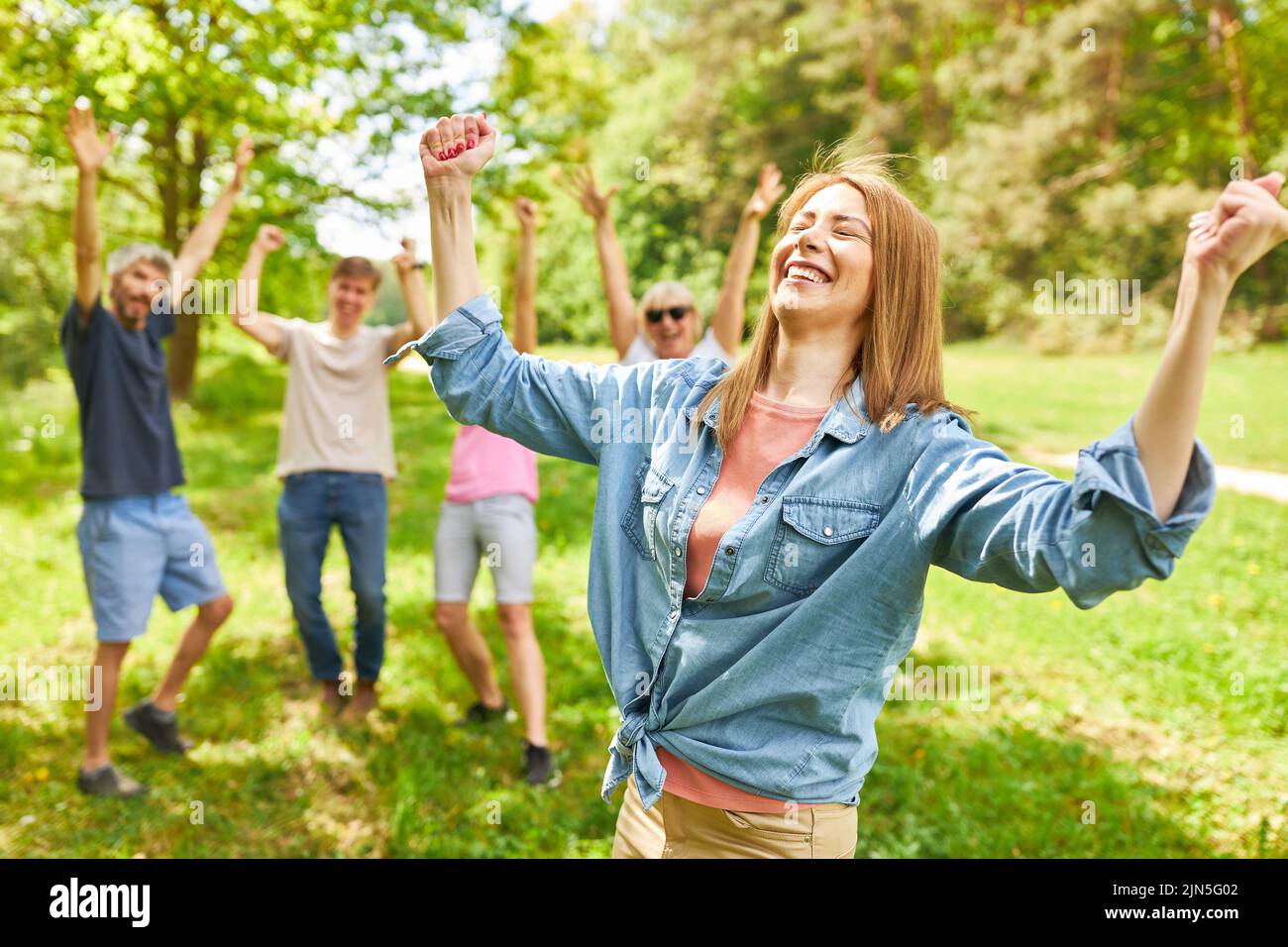 Winning team celebrates a success in game or competition with clenched ...
