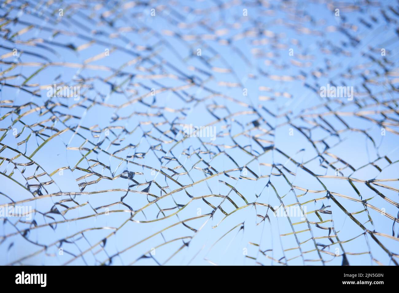 A large pane of safety glass in a patio door that has spontaneously ...