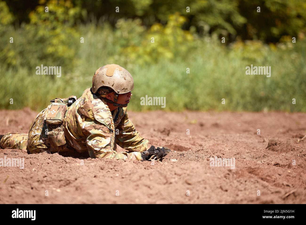 Soldiers game on military training ground battle camp. Action ...