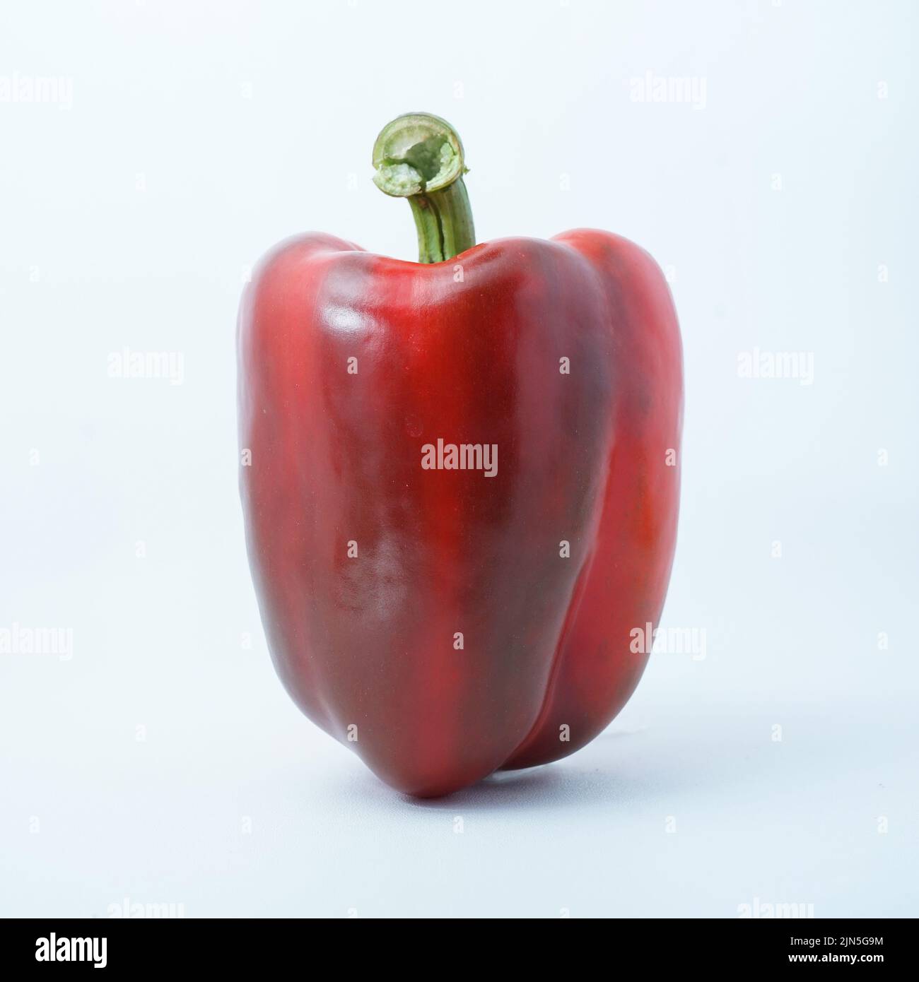 red sweet pepper isolated in high definition on white background Stock ...