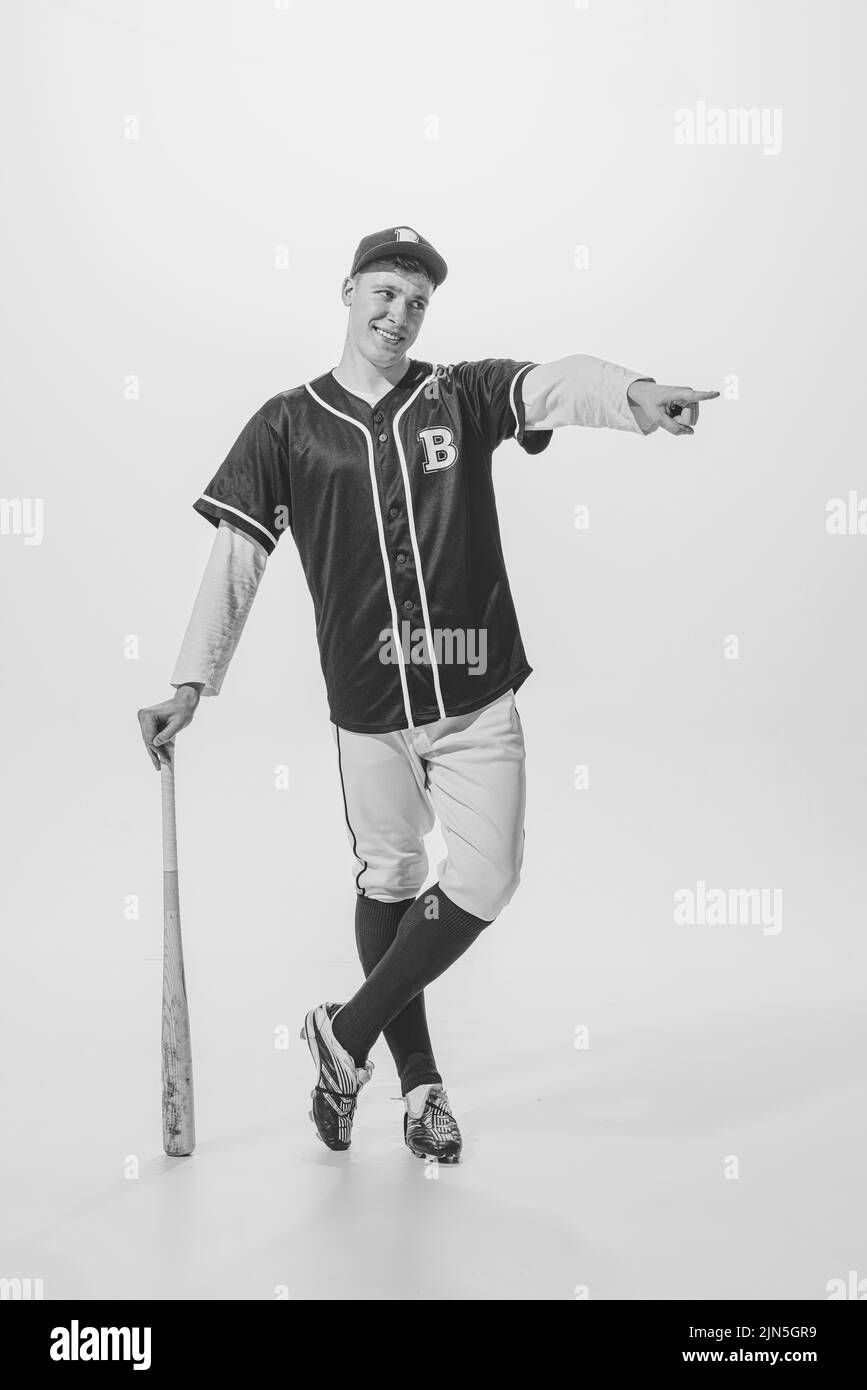 Portrait of cheerful handsome young man, student, baseball player ...