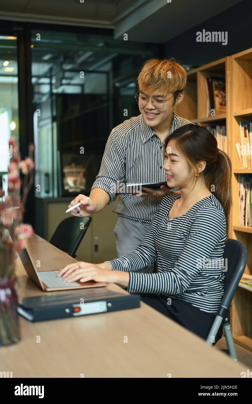 Coding programmers are brainstorming ideas for new project, collaborating on compiling algorithm ...