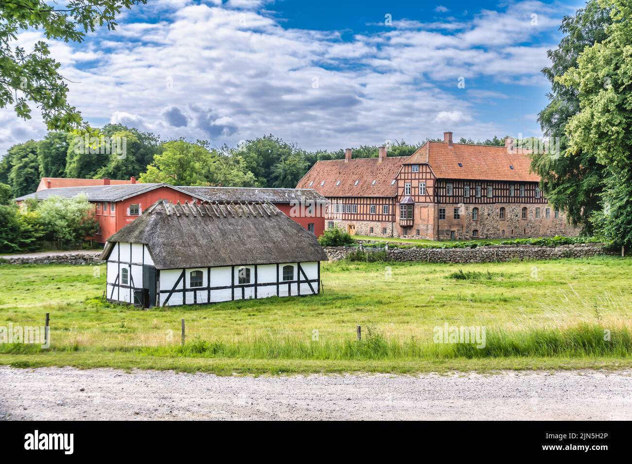 Old house and cows hi-res stock photography and images - Alamy