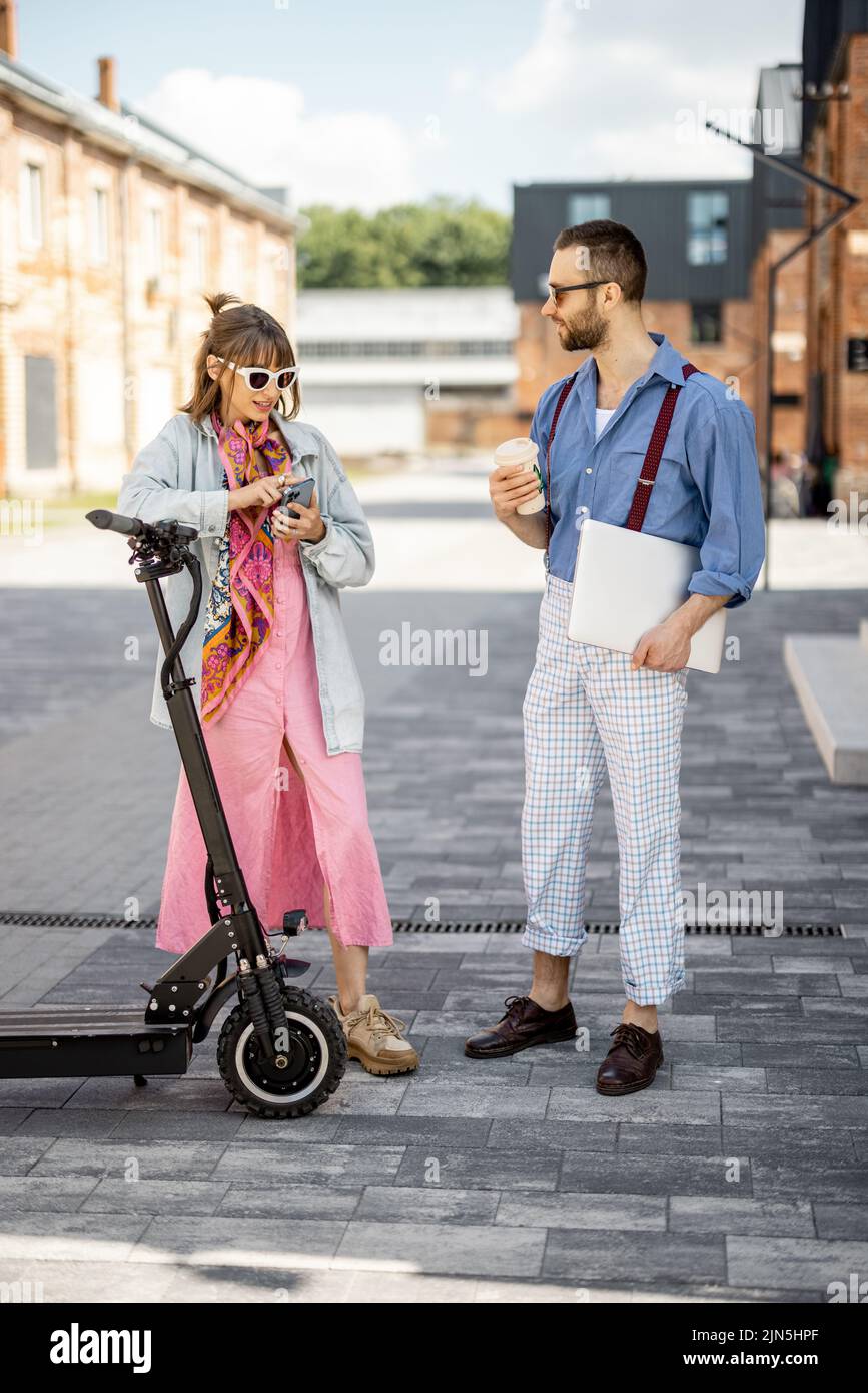 Stylish colleagues meet together outdoors Stock Photo - Alamy
